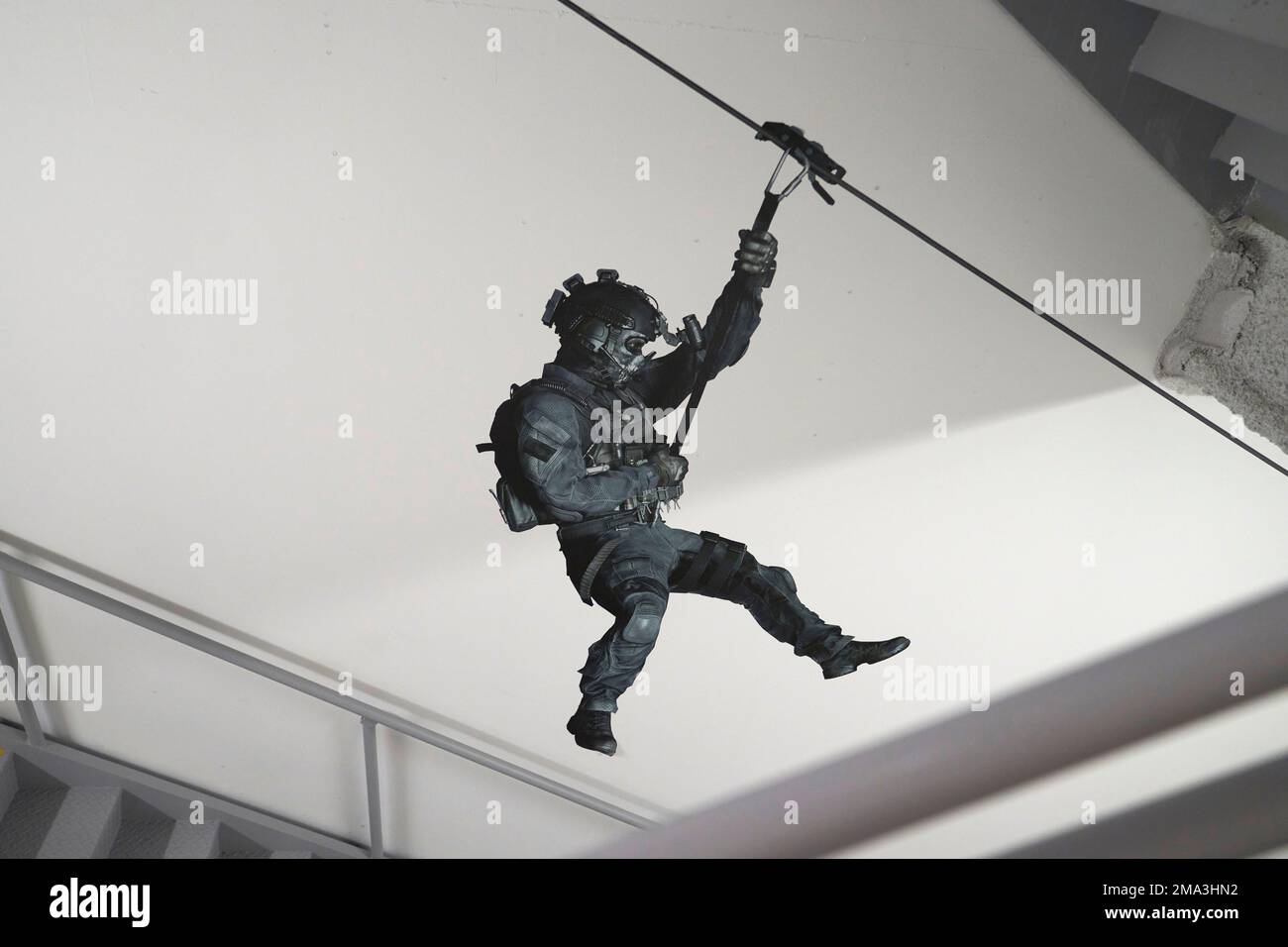 A Call of Duty character hangs on the wall in a stairwell on Friday ...