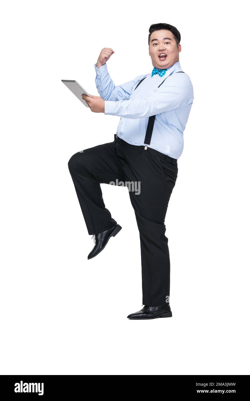 Take a tablet of obese young men Stock Photo - Alamy