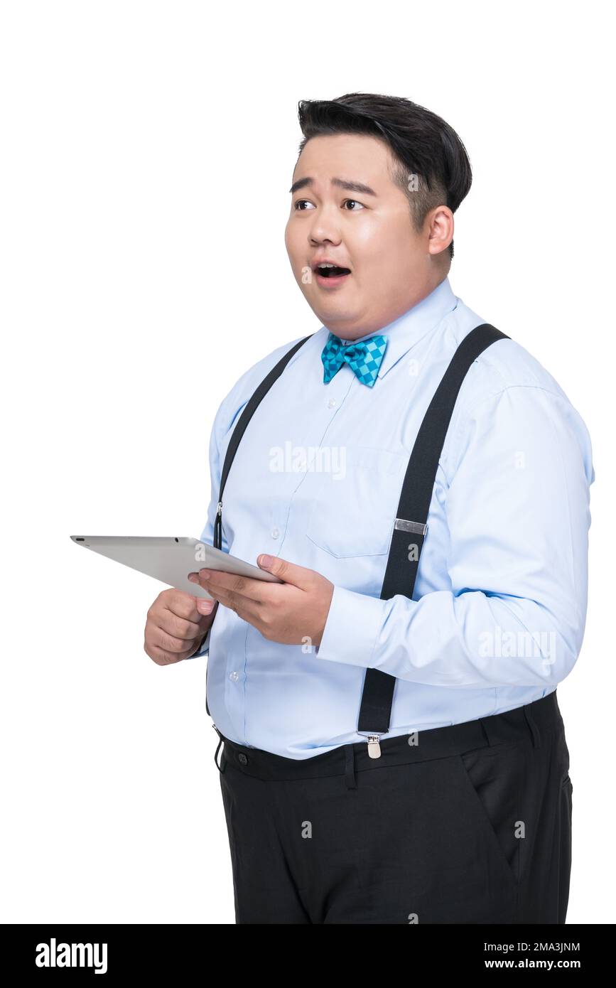 Take a tablet of obese young men Stock Photo - Alamy