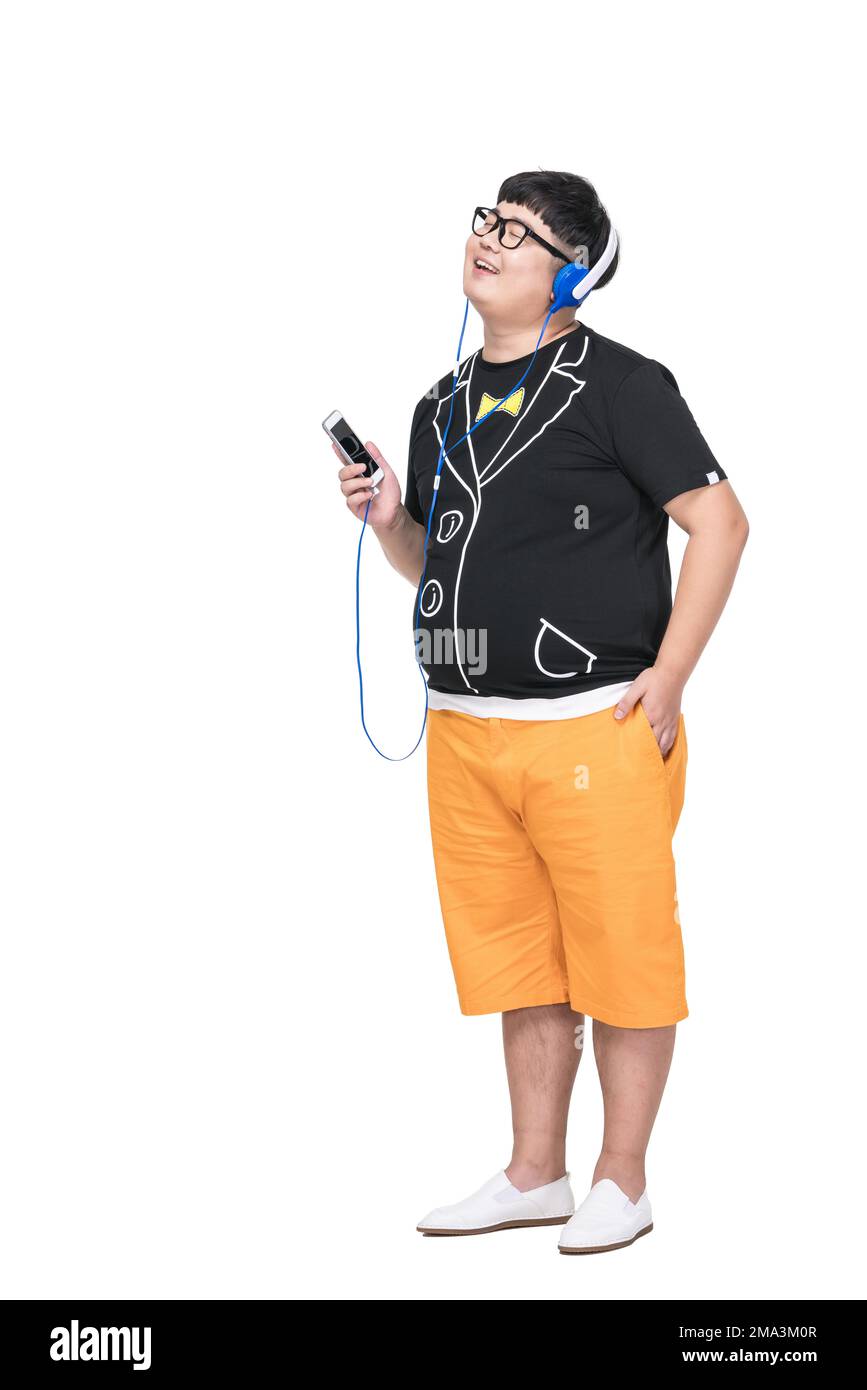 Fat young men listen to music Stock Photo - Alamy