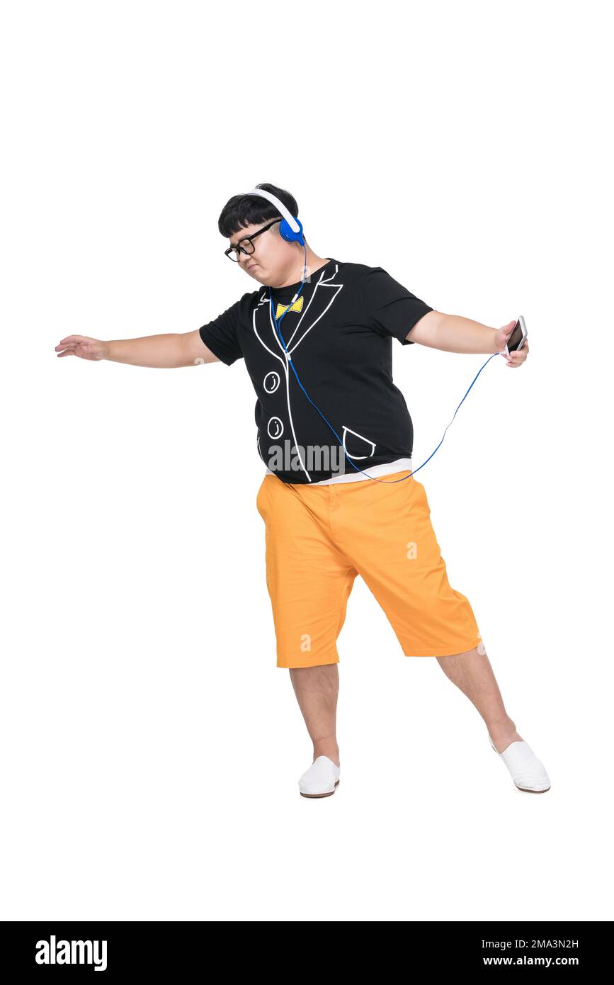 Fat young men listen to music Stock Photo - Alamy