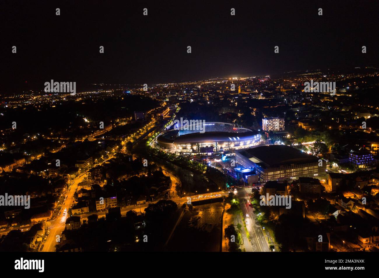 Aerial view of Cluj Napoca city by night. Urban landscape with ...