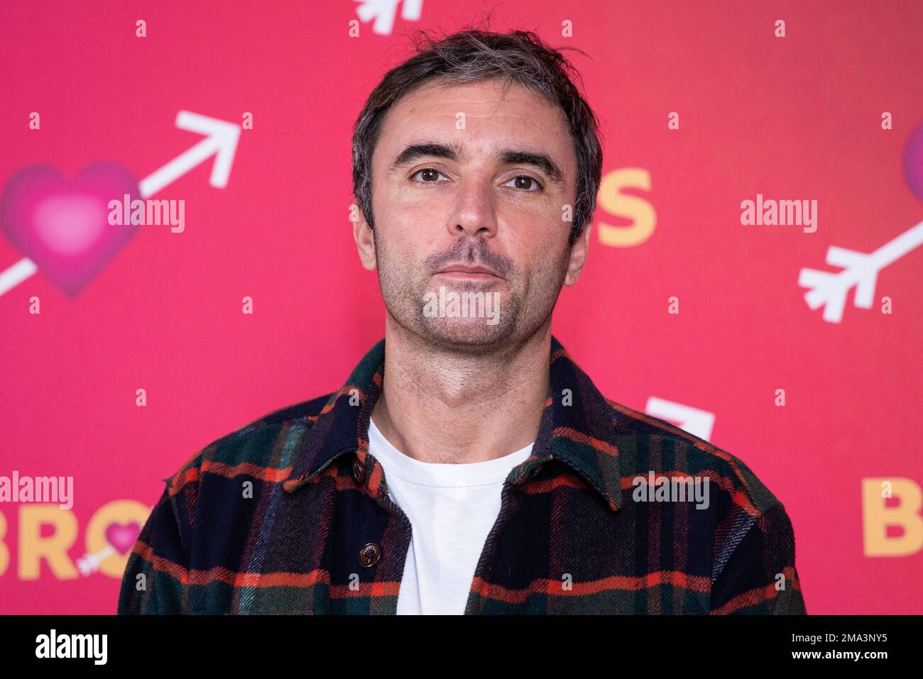 Chris Sweeney poses for photographers upon arrival for the premiere of the film 'Bros' in London ...
