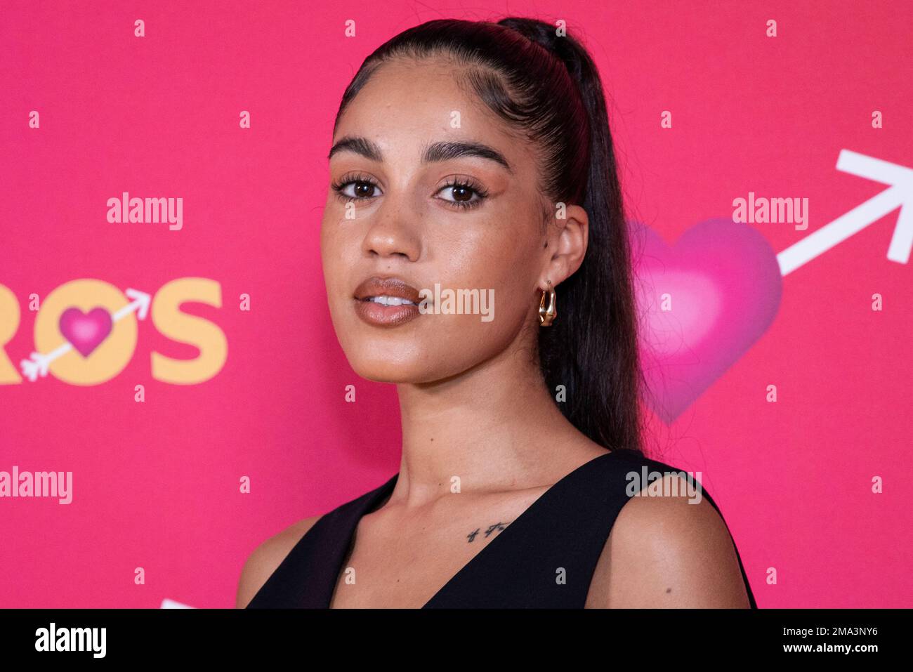 Abisha poses for photographers upon arrival for the premiere of the ...