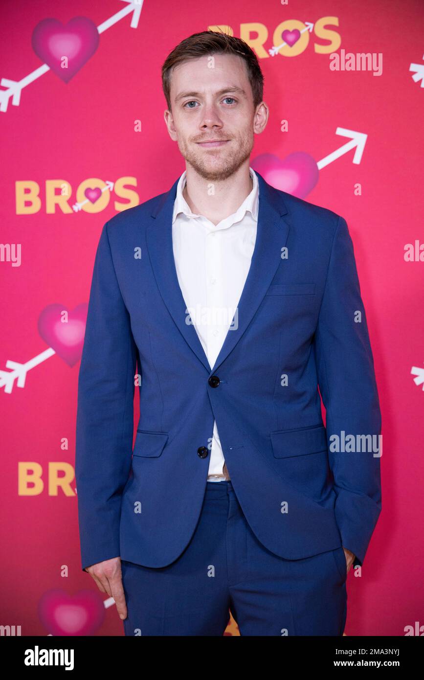 Owen Jones poses for photographers upon arrival for the premiere of the film 'Bros' in London ...