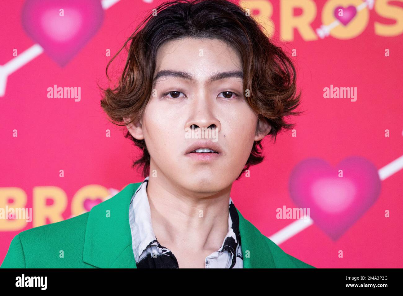 Darius Shu poses for photographers upon arrival for the premiere of the ...
