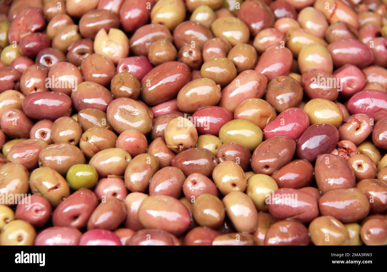 Red pickled olives on a traditional Moroccan market (souk), Rabat ...