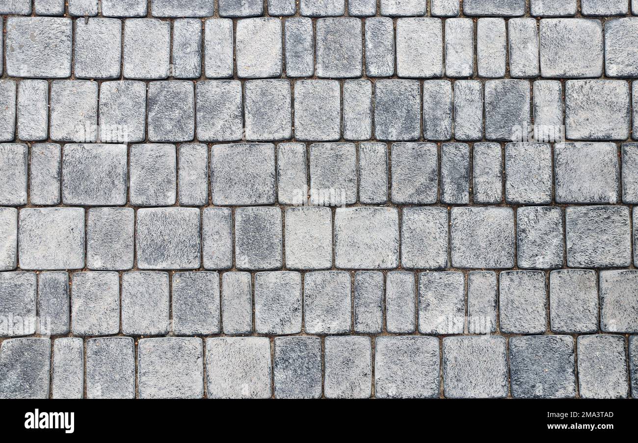 Paving slabs of gray color. Paving stones in a new walkway Stock Photo ...