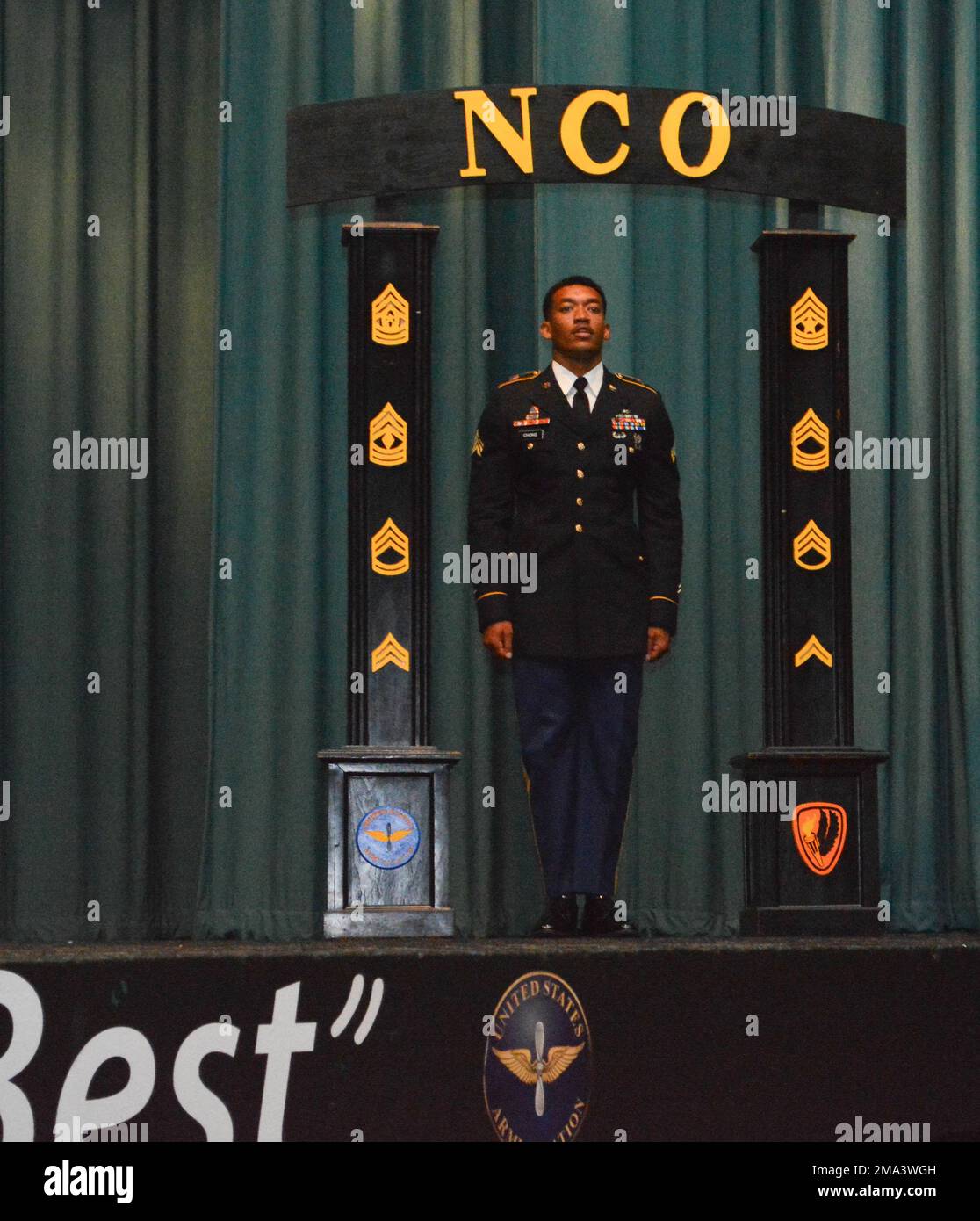 U.S. Army Staff Sgt. Andrew Zegura crosses the archway during a ...