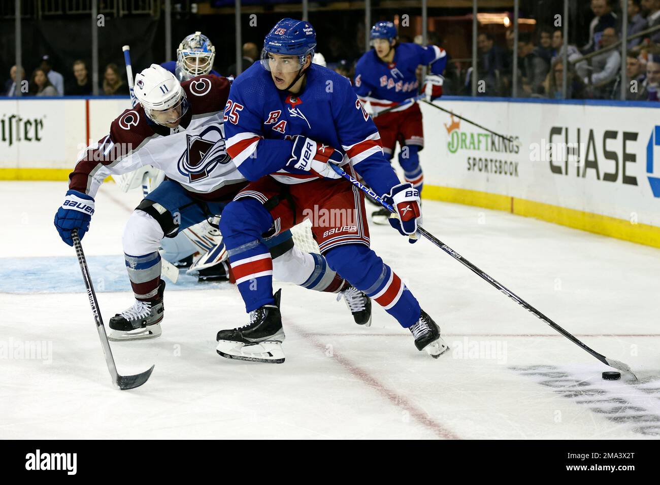 New York Rangers defenseman Libor Hajek (25) skates with the puck in ...