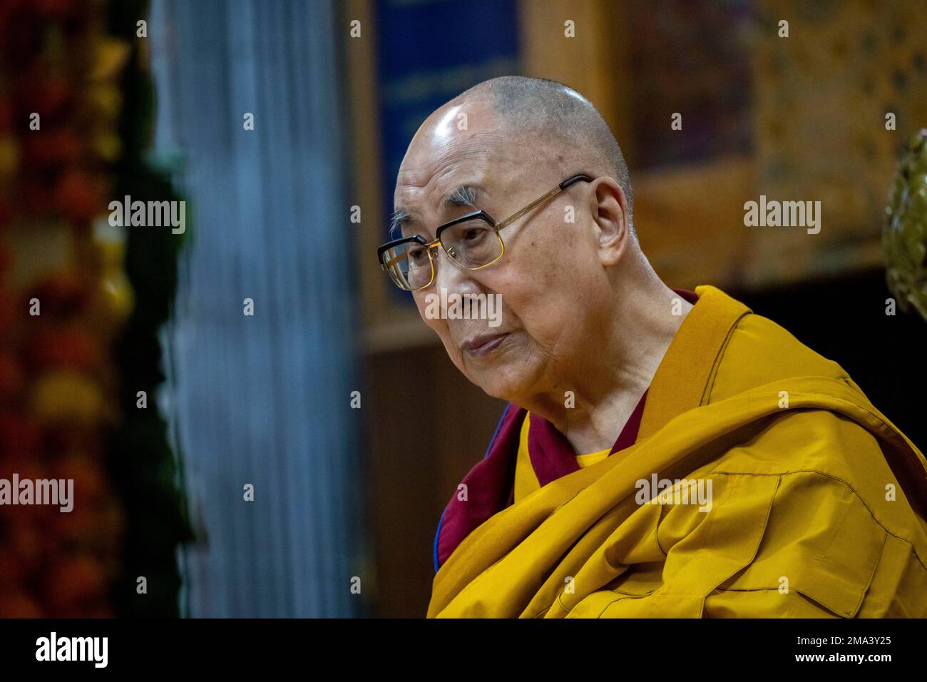 Tibetan spiritual leader the Dalai Lama attends a prayer by devotees ...
