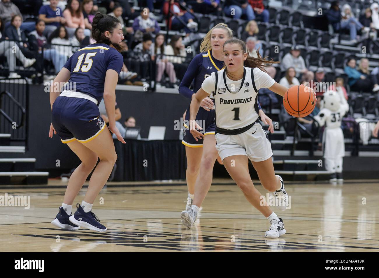 Providence's Kylee Sheppard (1) drives to the basket past Southern New ...
