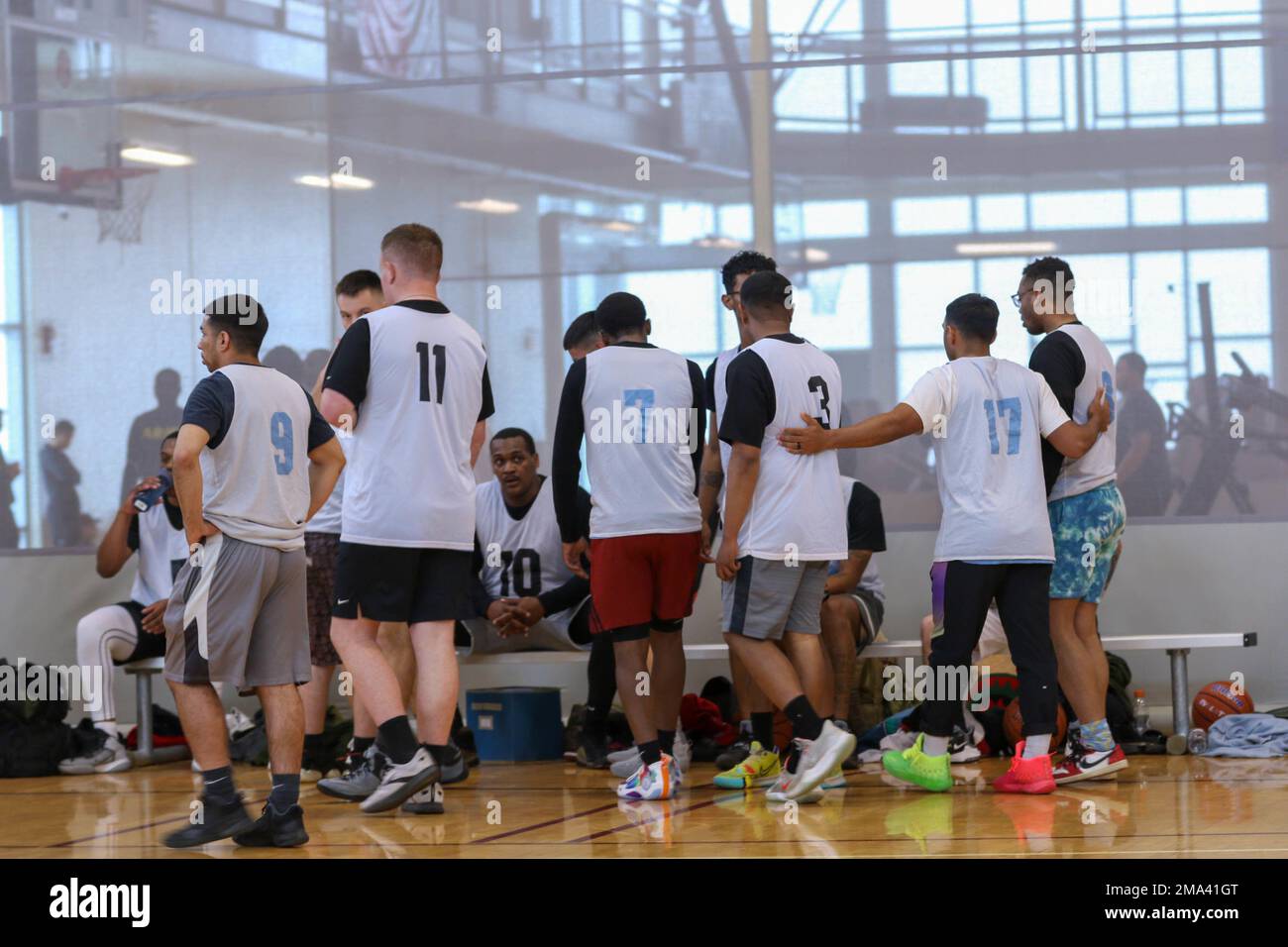 Soldiers assigned to 4th Engineer Battalion huddle during the ...