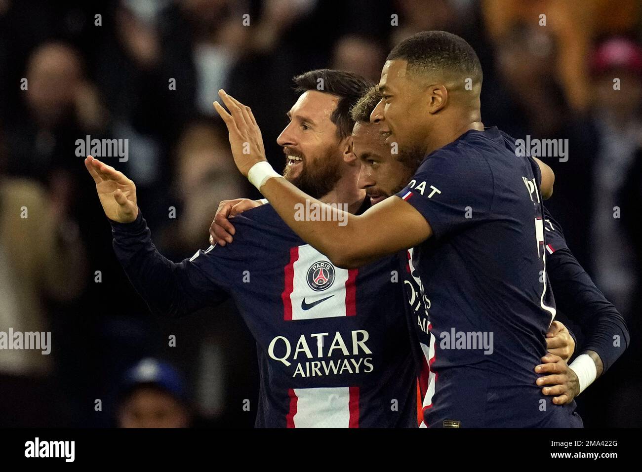 PSG's Neymar, center, celebrates PSG's Lionel Messi, left, and PSG's ...