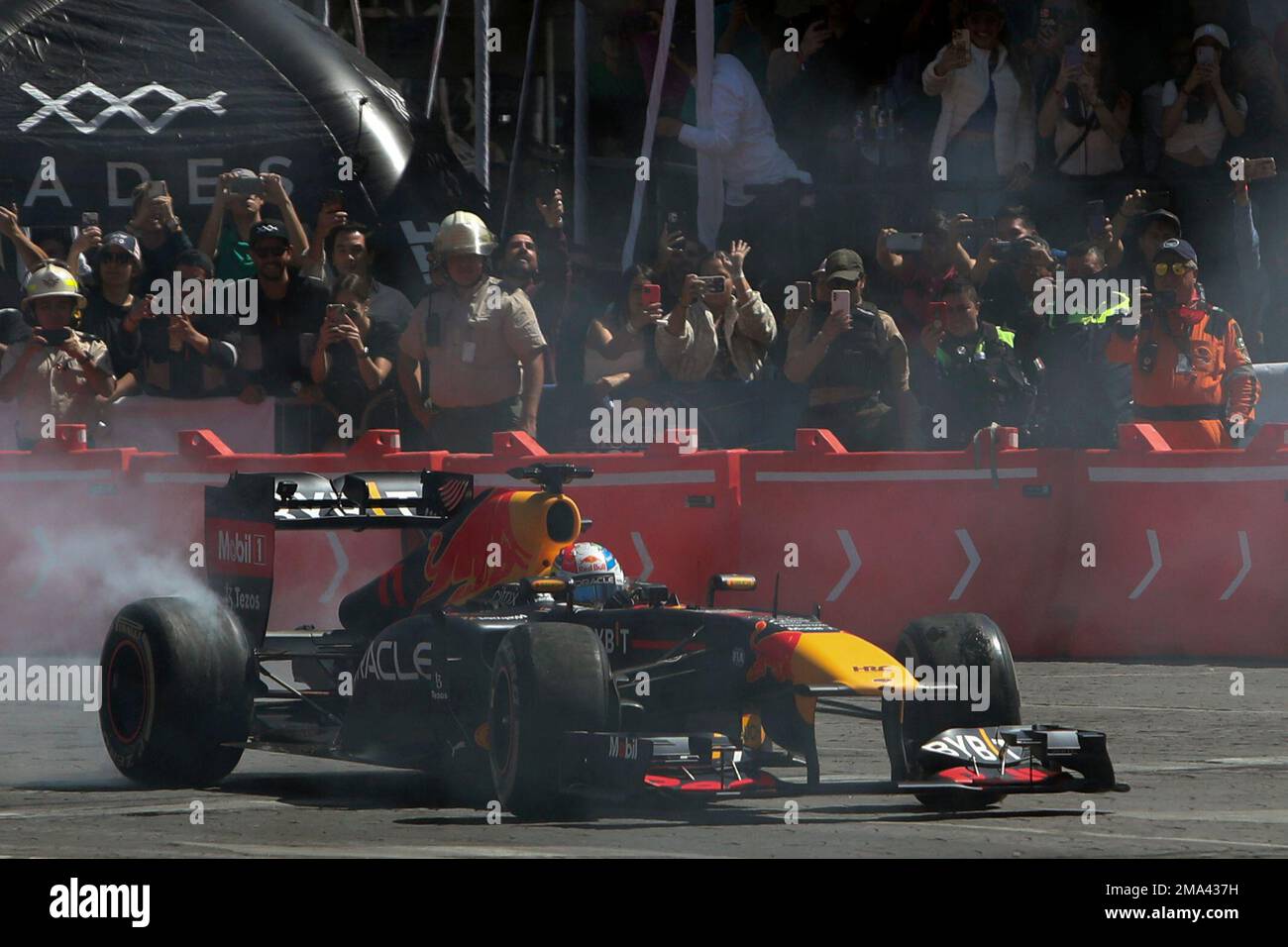 Mexican Formula One Red Bull driver Sergio "Checo" Perez drives in an exhibition race through ...