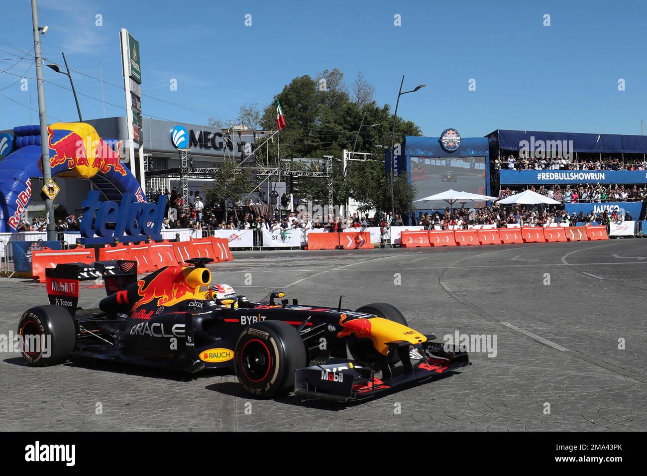 Mexican Formula One Red Bull driver Sergio "Checo" Perez drives in an exhibition race through ...