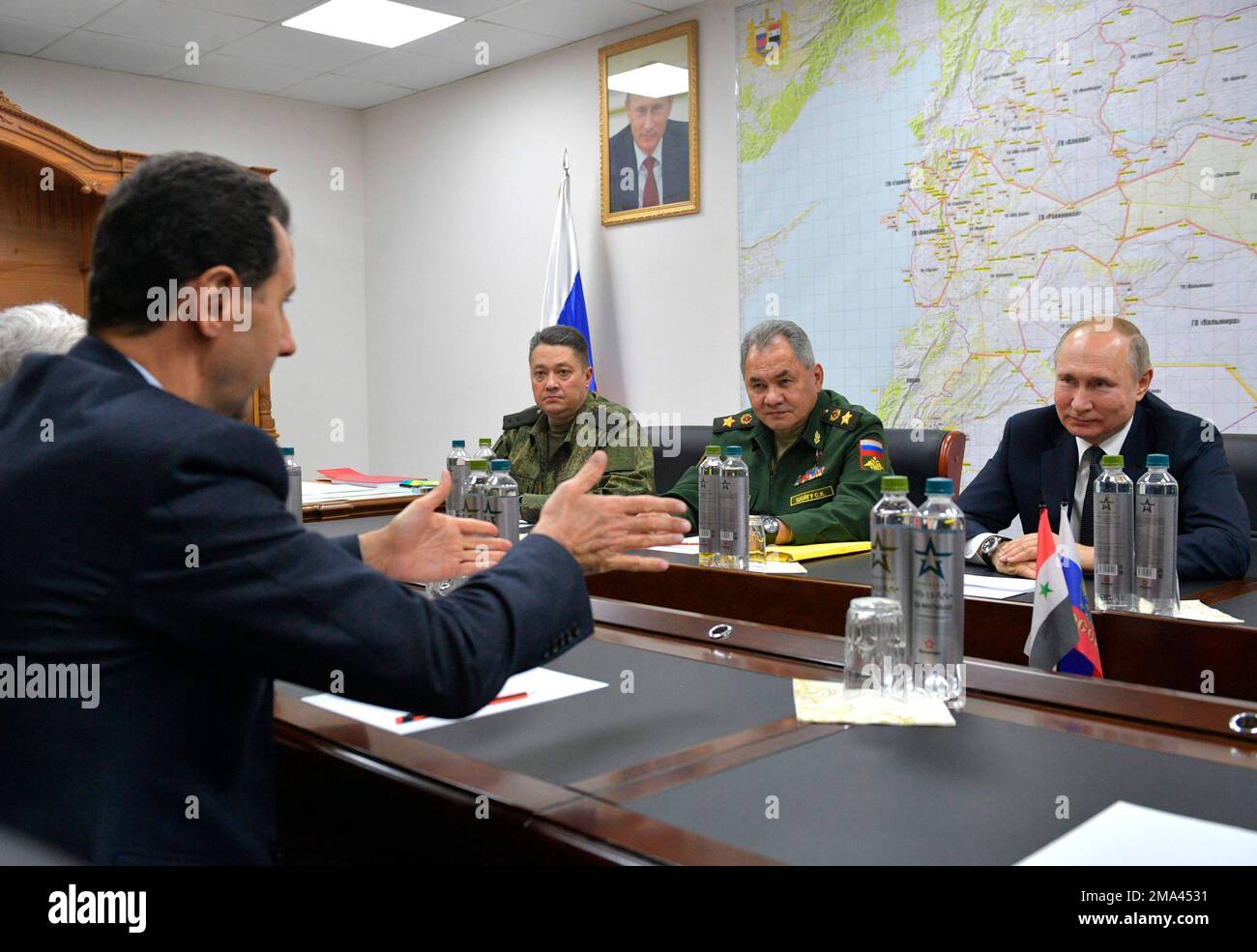 Russian President Vladimir Putin, right, and Russian Defense Minister ...