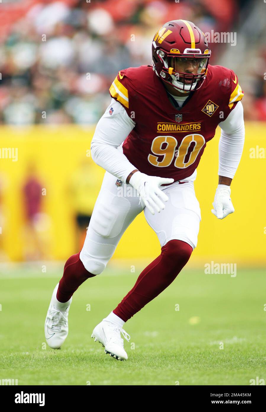 Washington Commanders defensive end Montez Sweat (90) runs during an ...