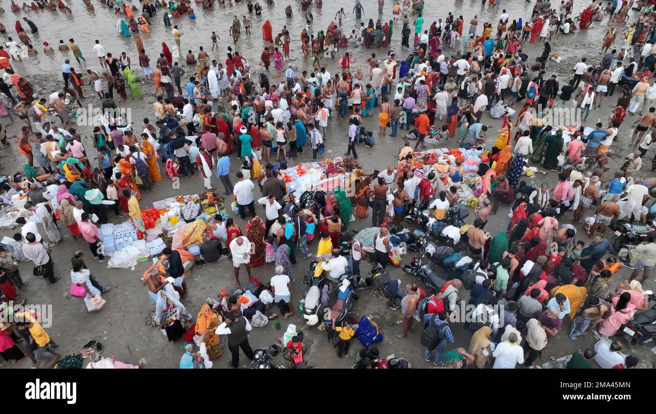 Hindu devotees perform rituals in the Sangam, the confluence of the ...