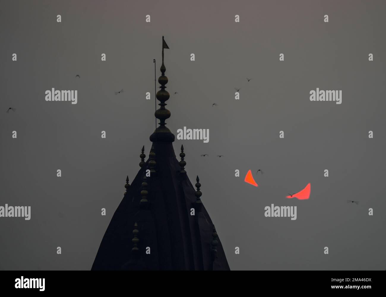 A partial solar eclipse is seen behind the centuries-old Raghunath ...