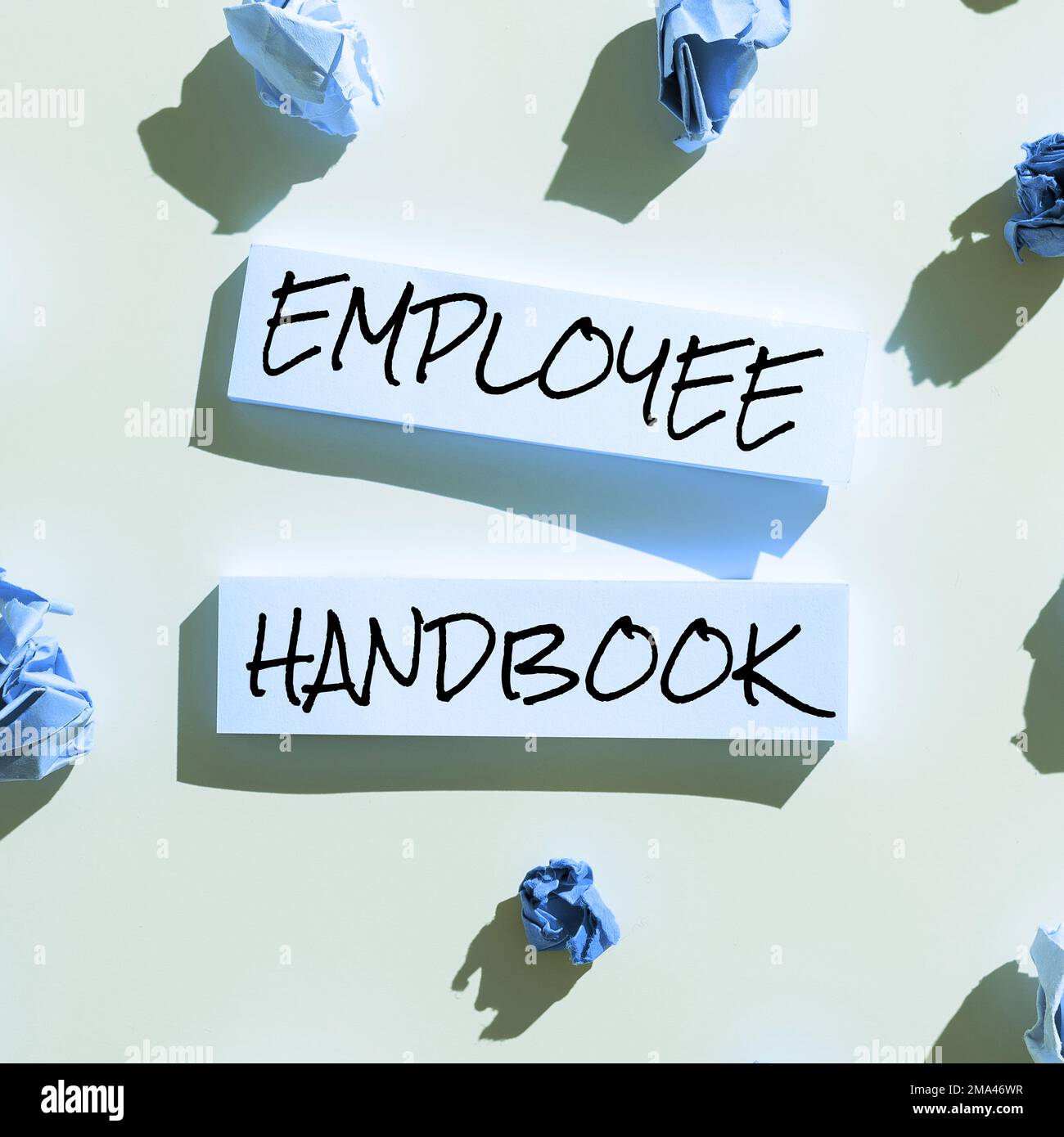 Hand writing sign Employee Handbook. Word Written on Document that ...