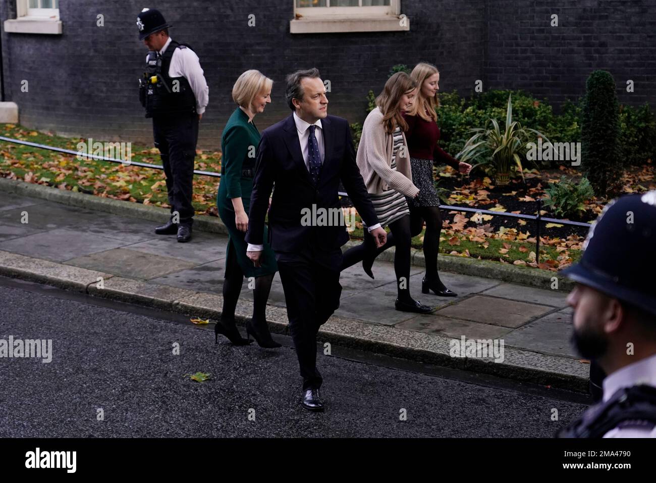 Outgoing British Prime Minister Liz Truss, second from left, her ...