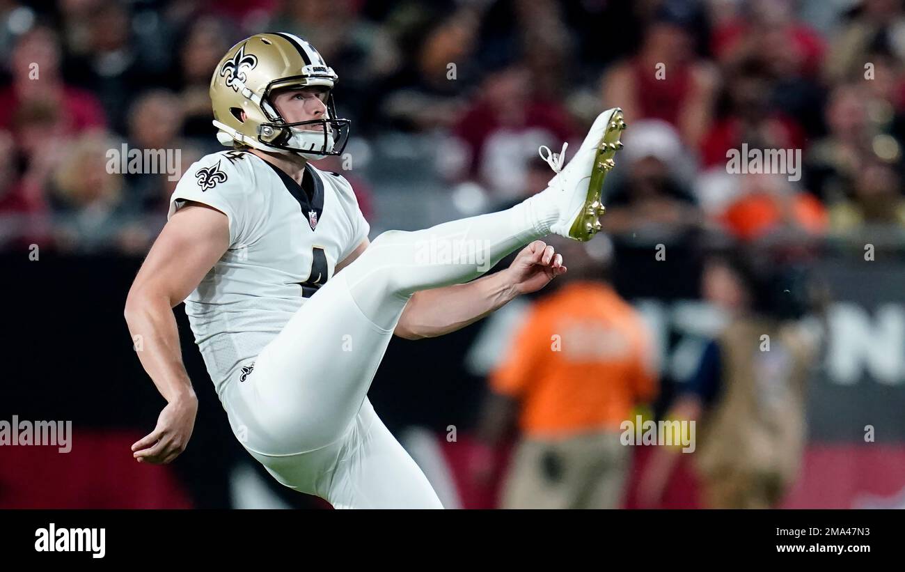 New Orleans Saints punter Blake Gillikin kicks the ball against the ...