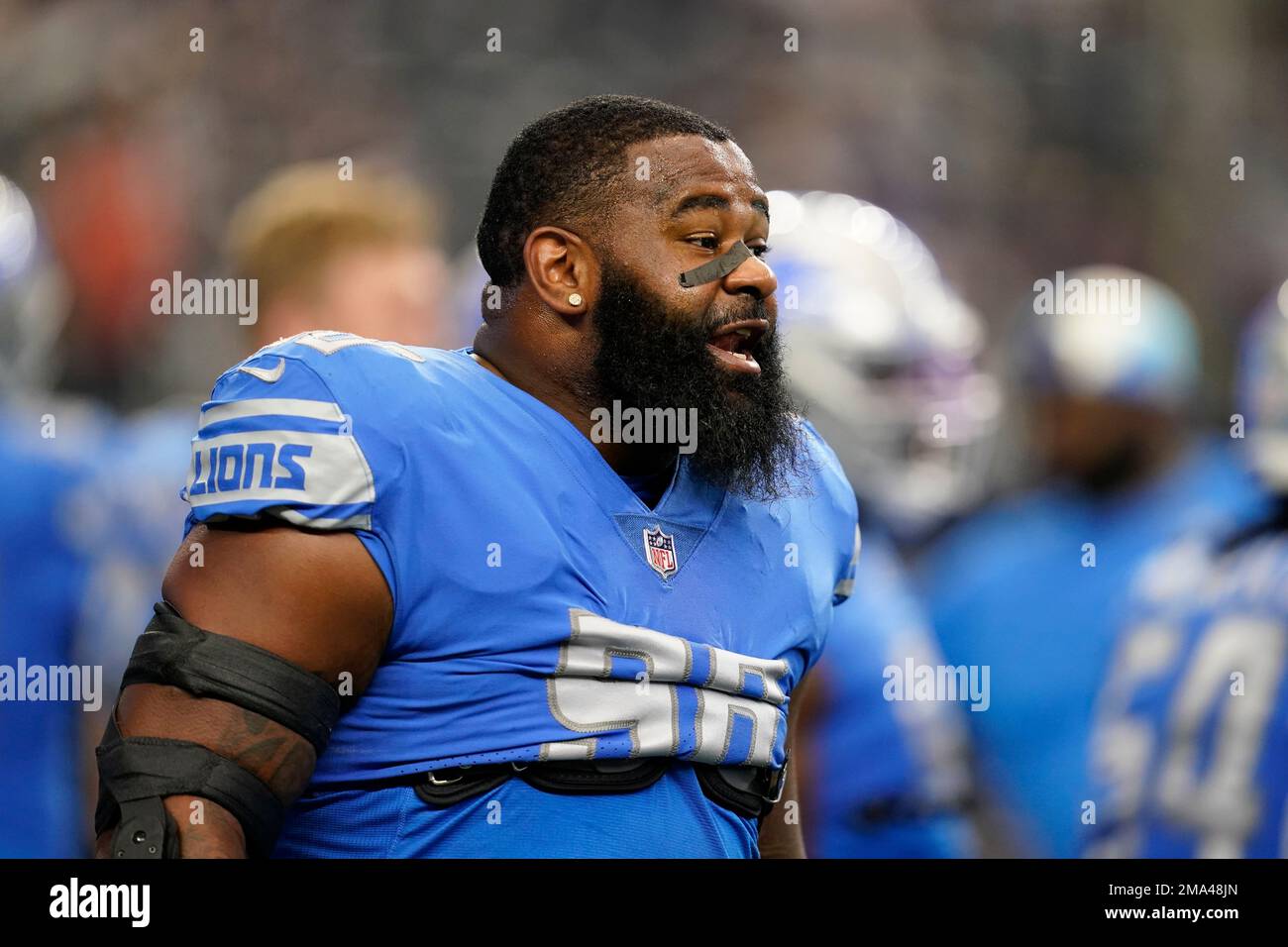 Detroit Lions' Isaiah Buggs motivates his team during warmups before an ...