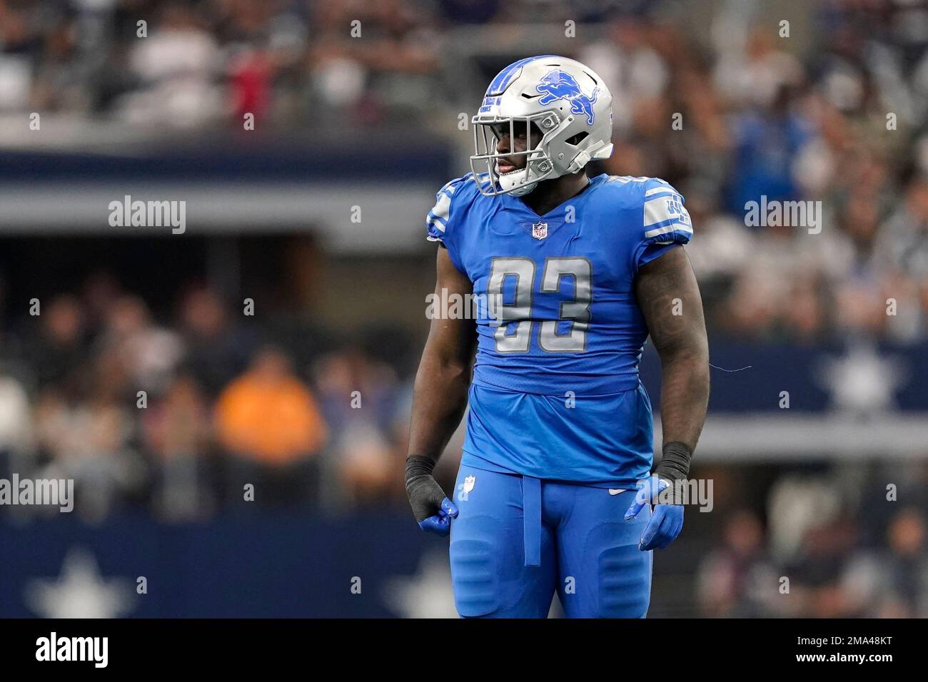 Detroit Lions defensive end Josh Paschal prepares to line up against ...