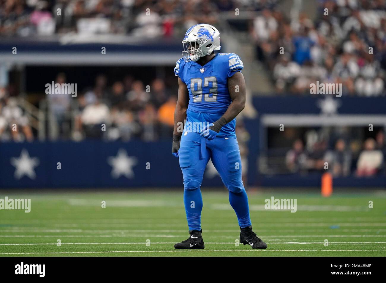 Detroit Lions defensive end Josh Paschal prepares to line up against ...