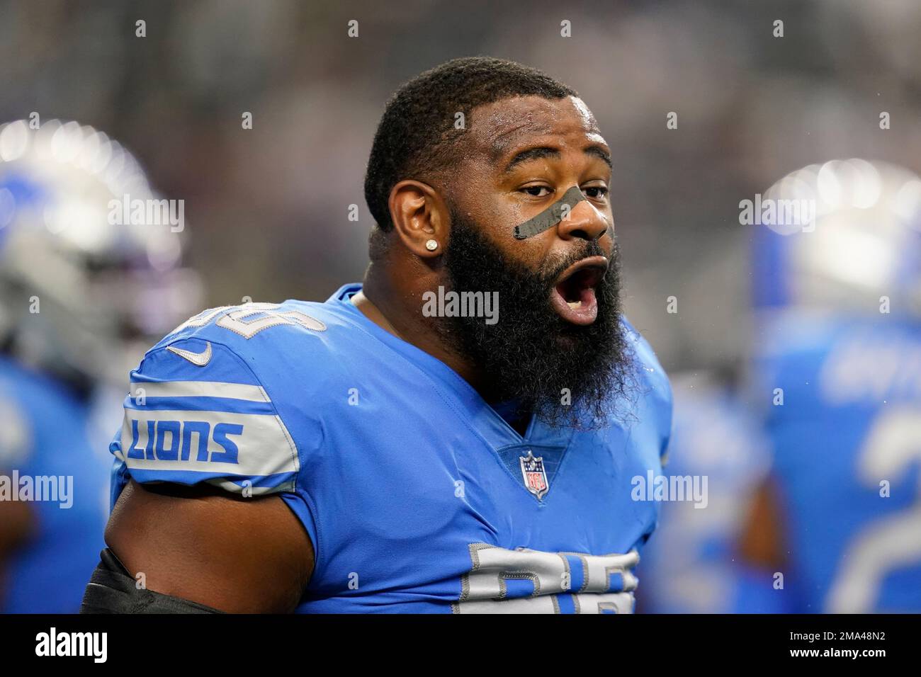 Detroit Lions' Isaiah Buggs motivates his team during warmups before an ...