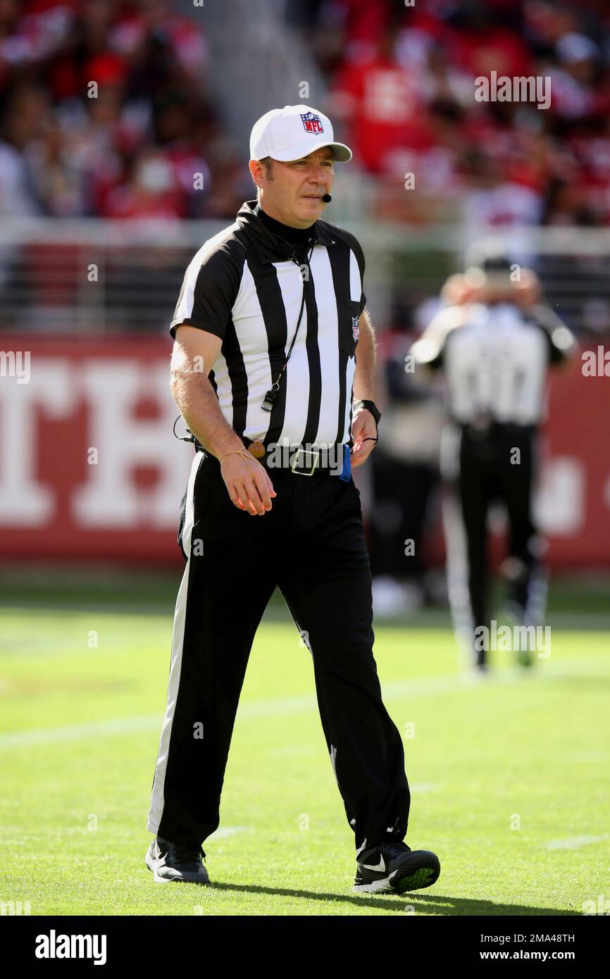 referee Alex Kemp (55) reacts during an NFL football game between the ...
