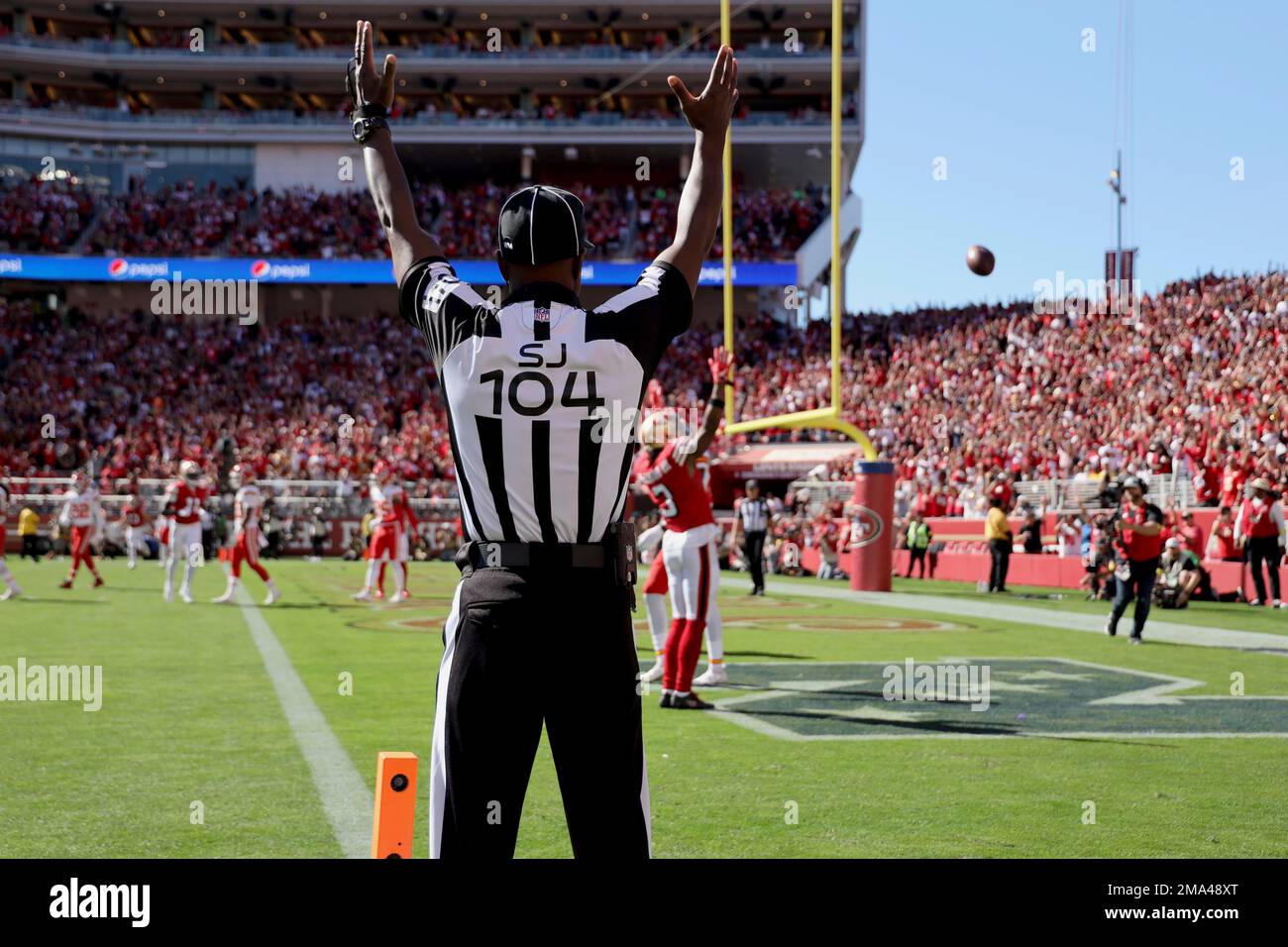 Side judge Dale Shaw (104) signals during an NFL football game between ...