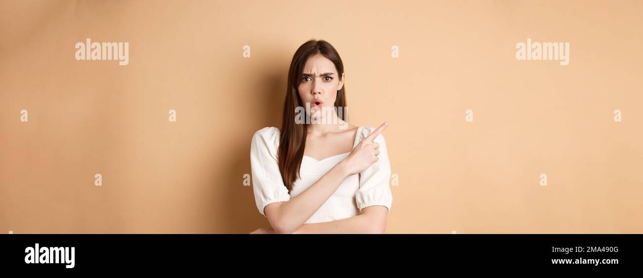 What is that. Shocked and angry woman scolding person, frowning and ...