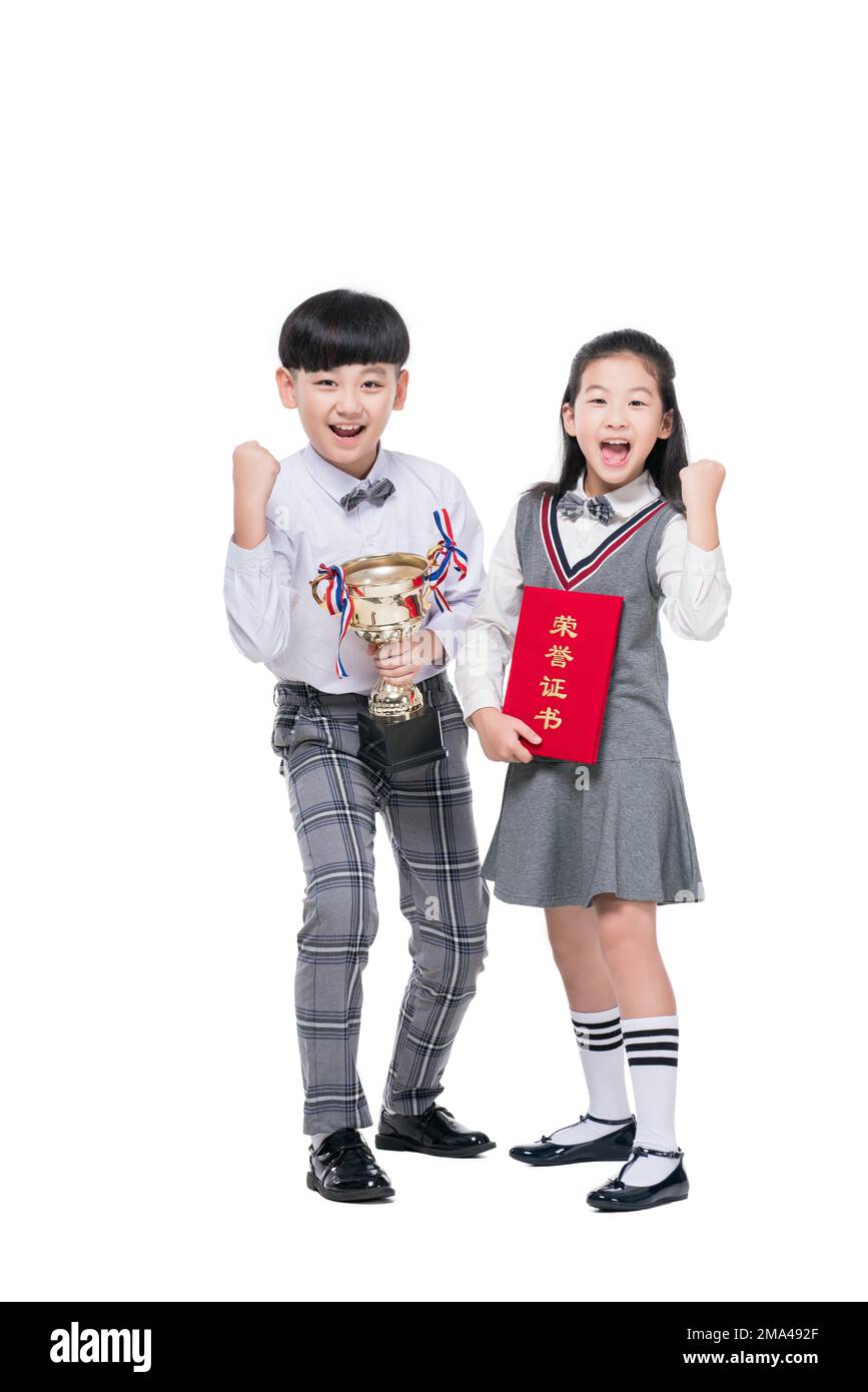 Happy pupils with a trophy and certificate Stock Photo - Alamy