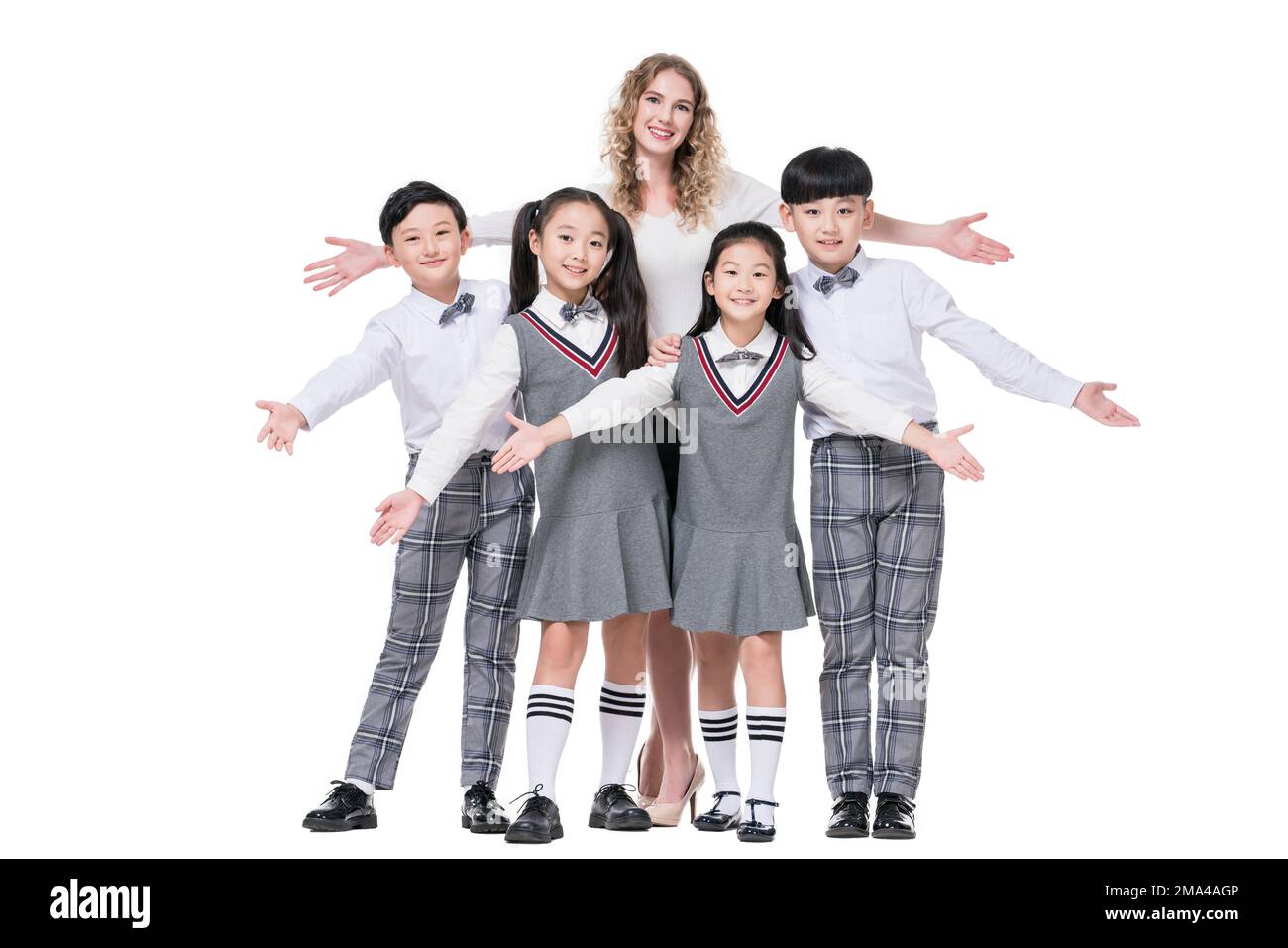 Female teachers guide students learning Stock Photo - Alamy