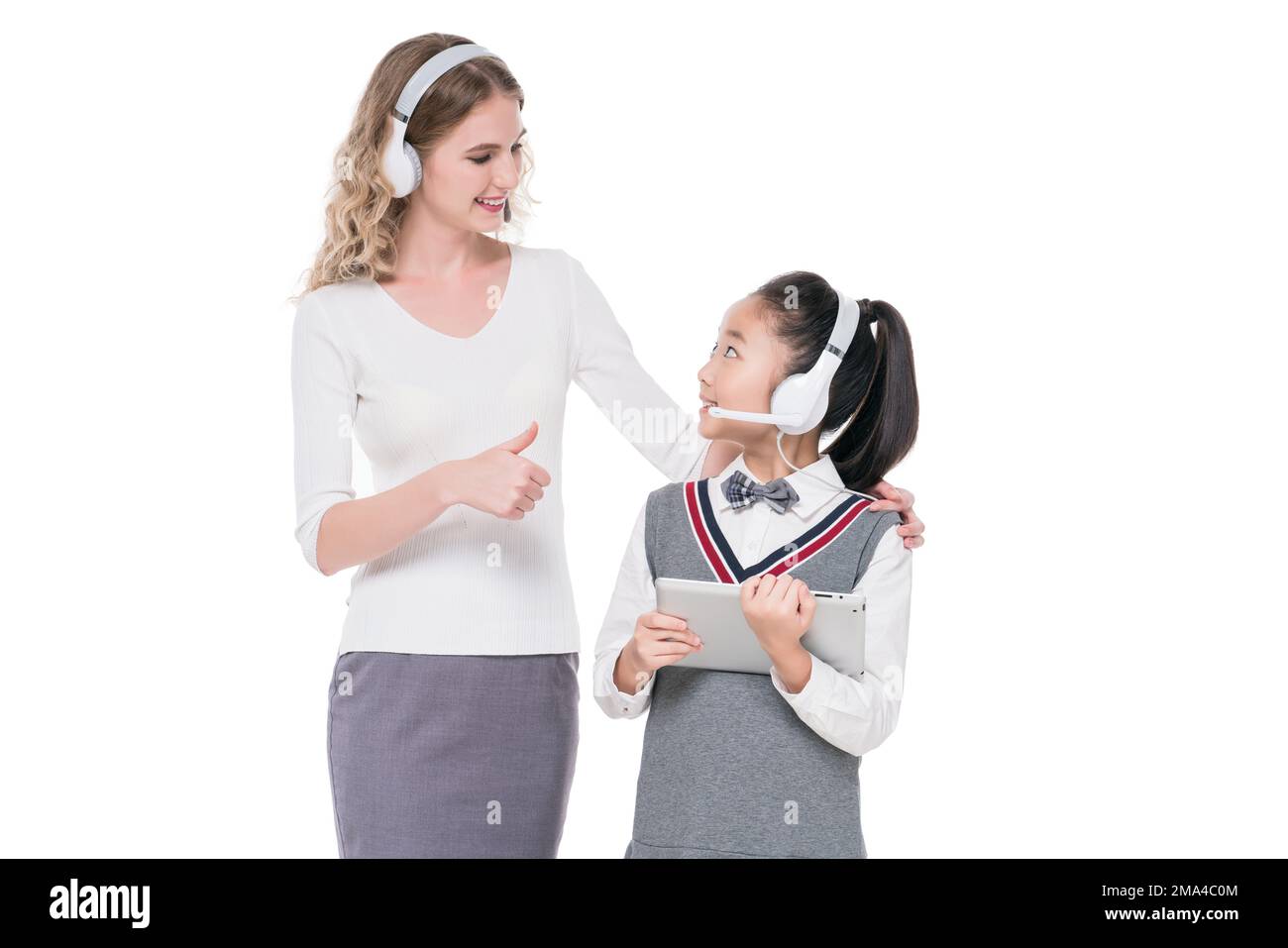 Female teachers guide students learning Stock Photo - Alamy