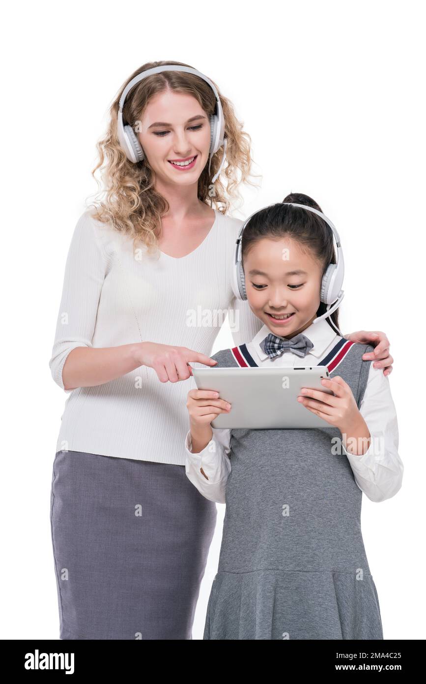 Female teachers guide students learning Stock Photo - Alamy