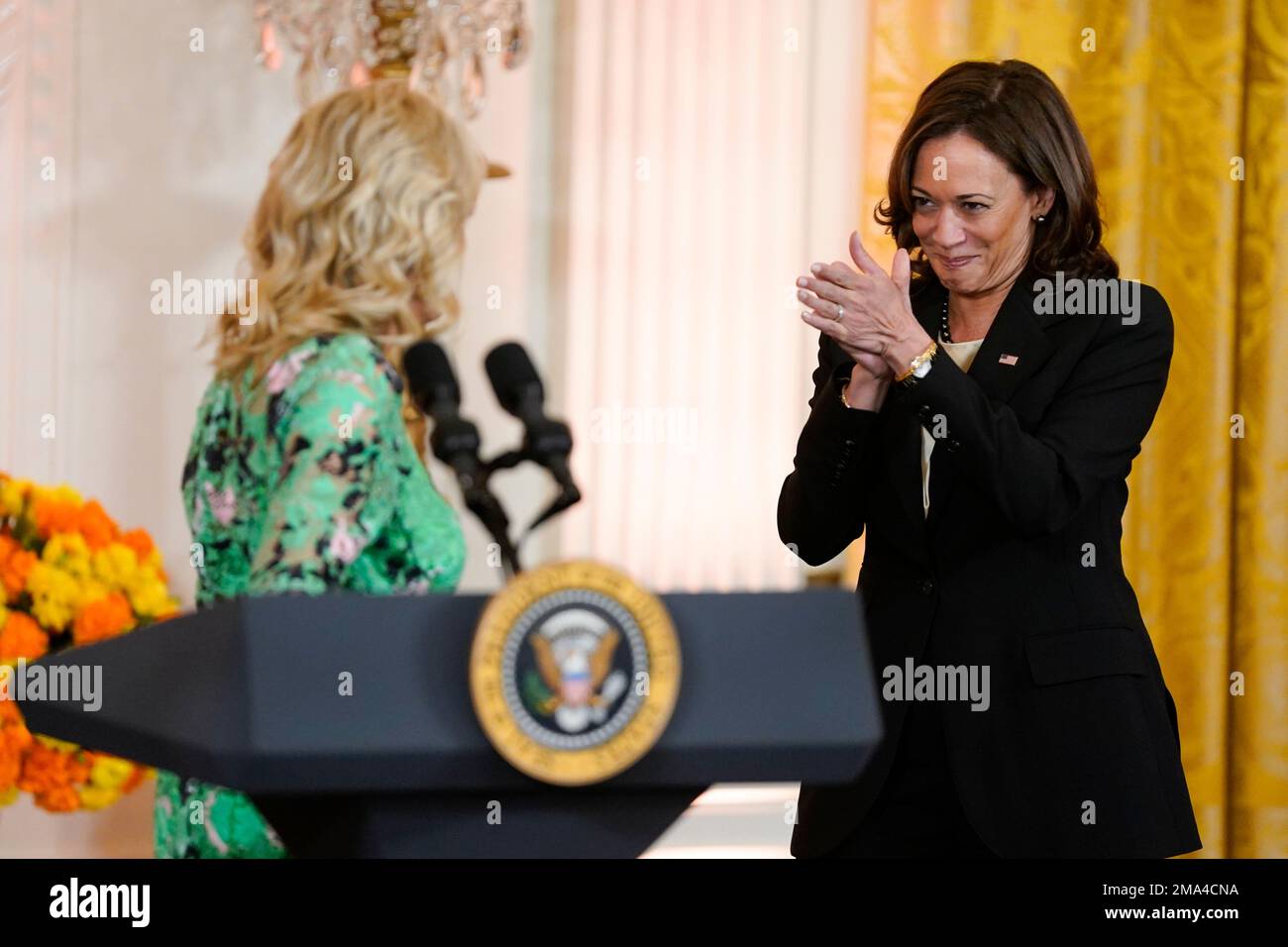 Vice President Kamala Harris applauds first lady Jill Biden after she ...