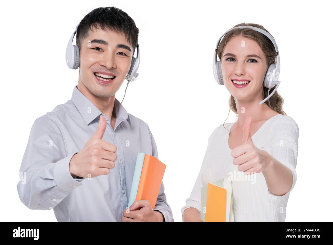 Two young men wearing headphones Stock Photo - Alamy