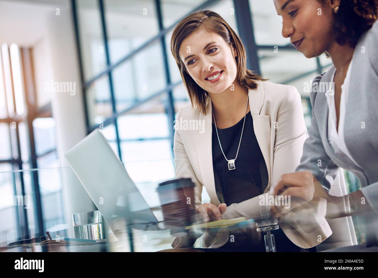Happy, data analysis or business women with laptop for business meeting ...