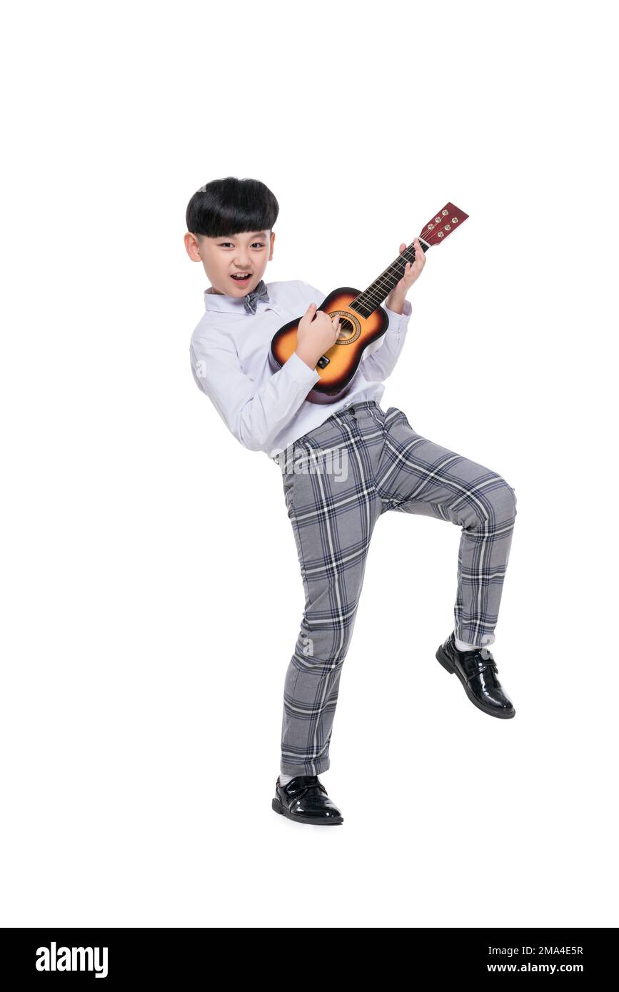Happy pupils playing the guitar Stock Photo - Alamy
