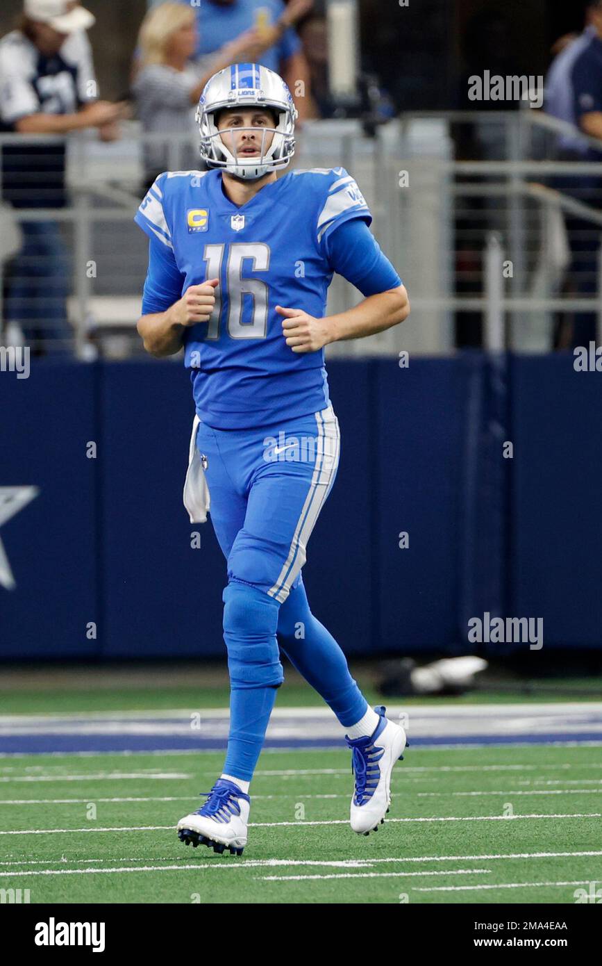 Detroit Lions quarterback Jared Goff jogs off the field during the ...
