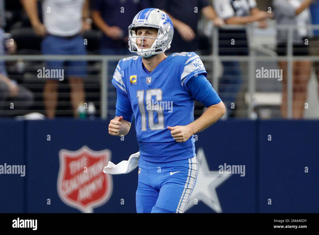 Detroit Lions quarterback Jared Goff jogs off the field during the ...