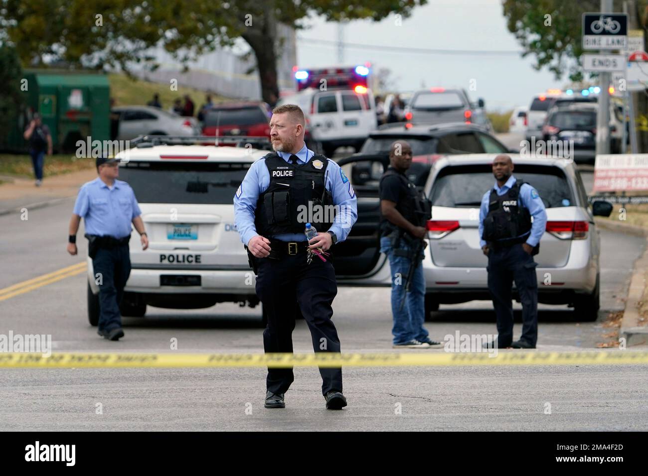 Law enforcement investigate the scene of a shooting at Central Visual ...