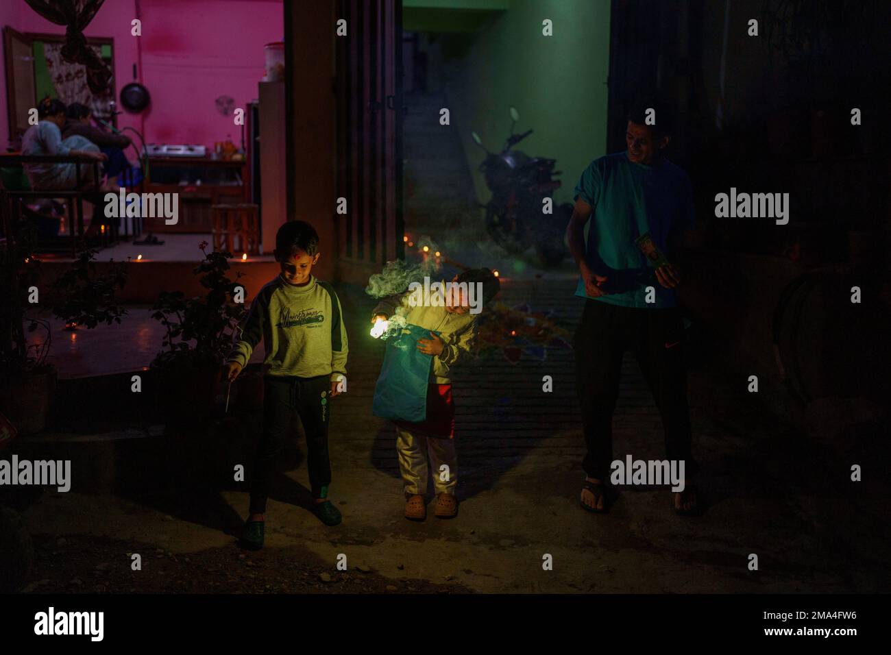 Children light firecrackers during Tihar festival in Kathmandu, Nepal ...