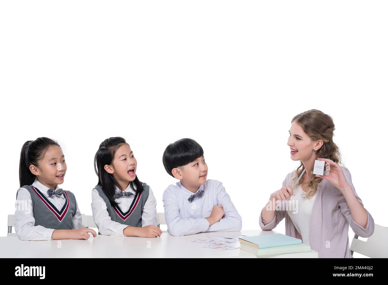 Female teachers guide students learning Stock Photo - Alamy