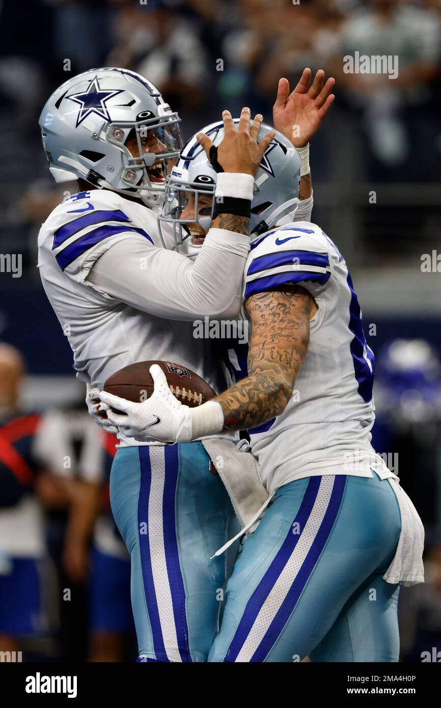 Dallas Cowboys quarterback Dak Prescott (4) and tight end Peyton ...