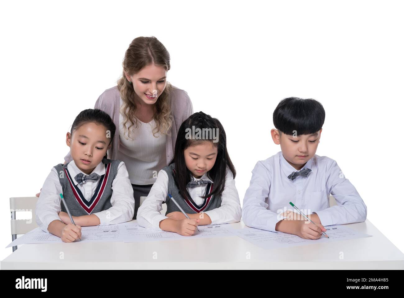 Female teachers guide students learning Stock Photo - Alamy