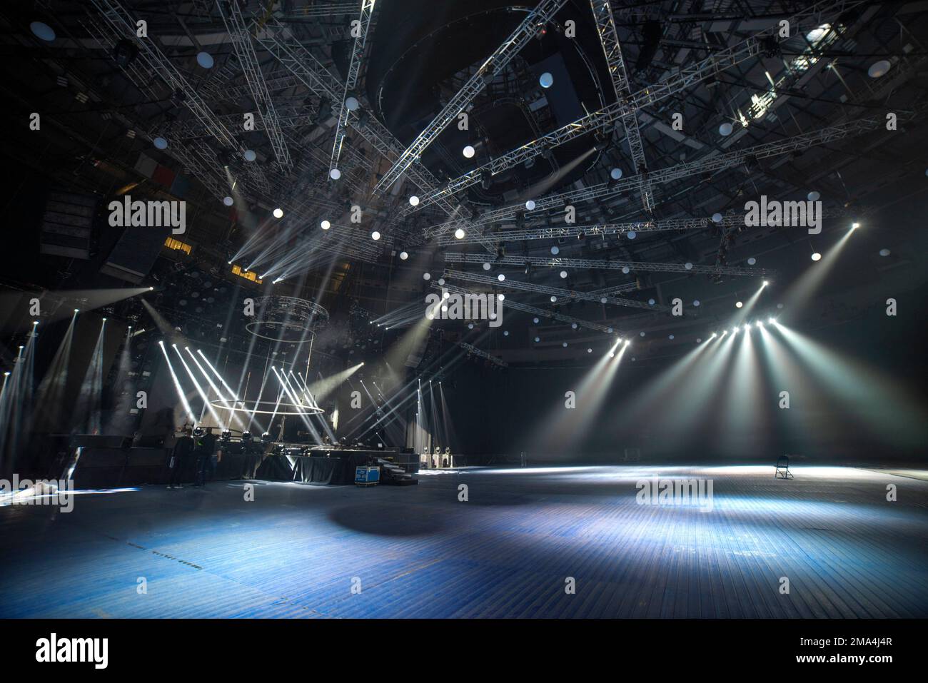 checking the lighting and preparing the stage for the concert ...